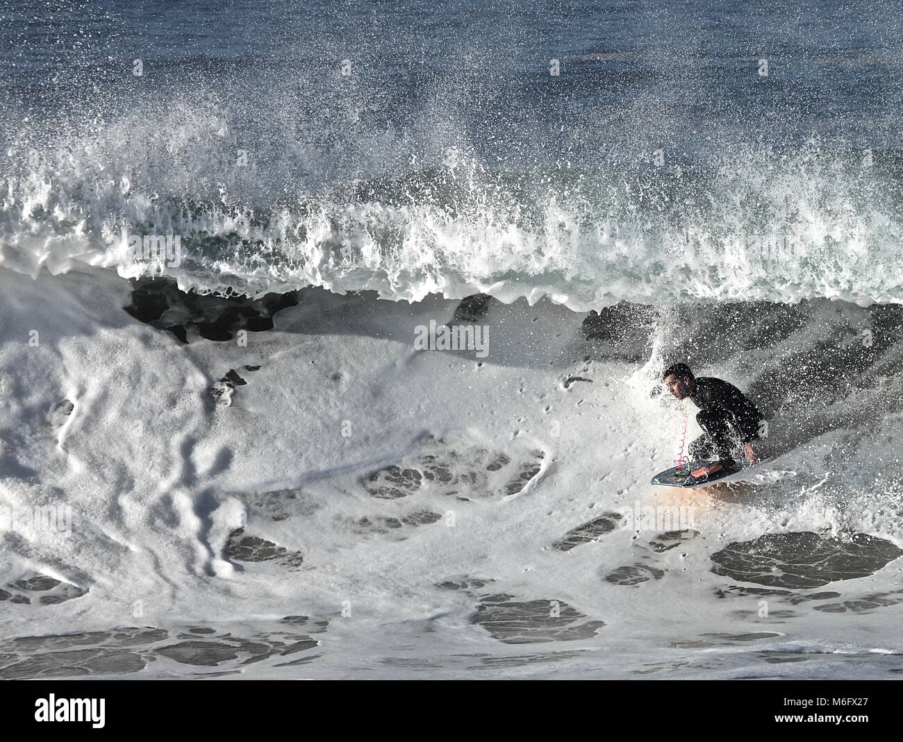 Surfing big waves at The Wedge Stock Photo - Alamy