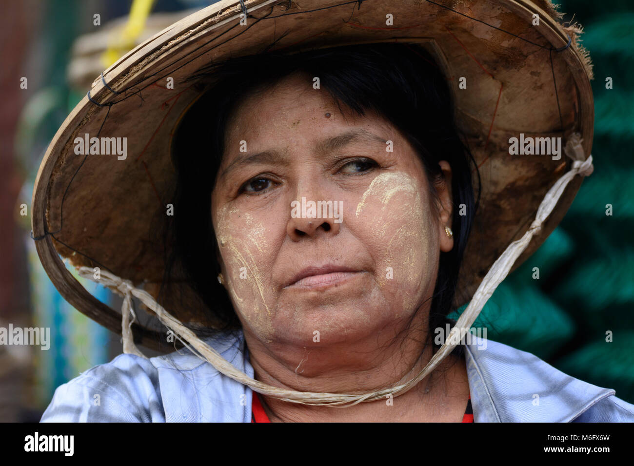 Mawlamyine (Mawlamyaing, Moulmein): vendor woman at market, face with ...