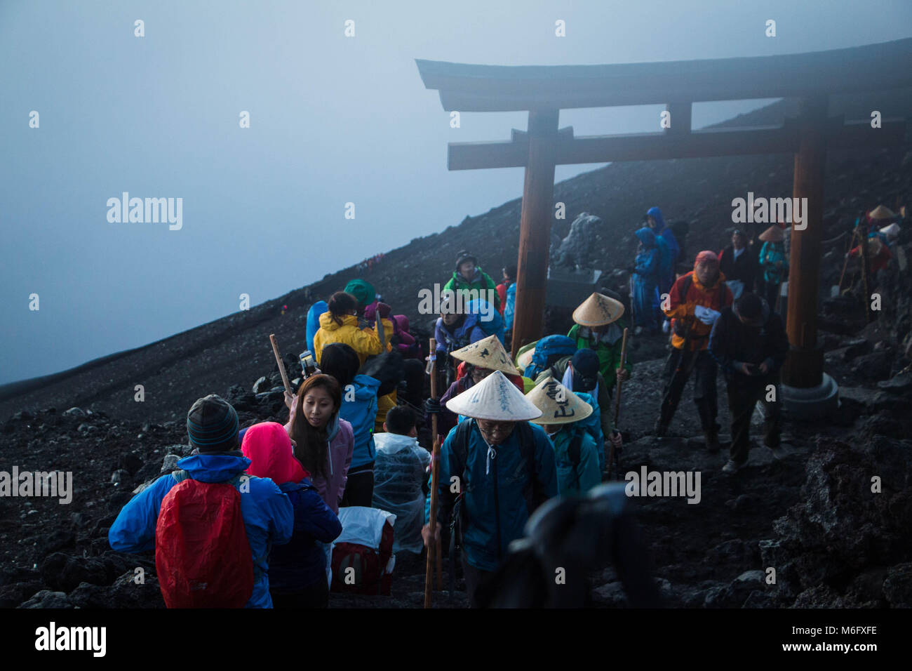 Travelling and hiking up Mount Fuji surrounded by the locals and the ...
