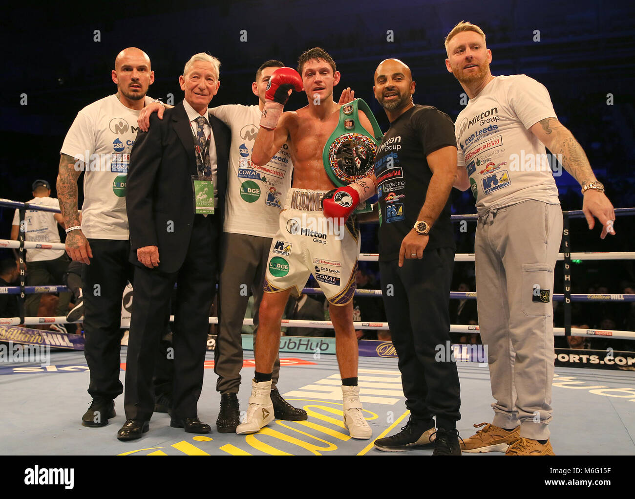 Gavin McDonnell (centre) celebrates after victory against Gamal Yafai ...