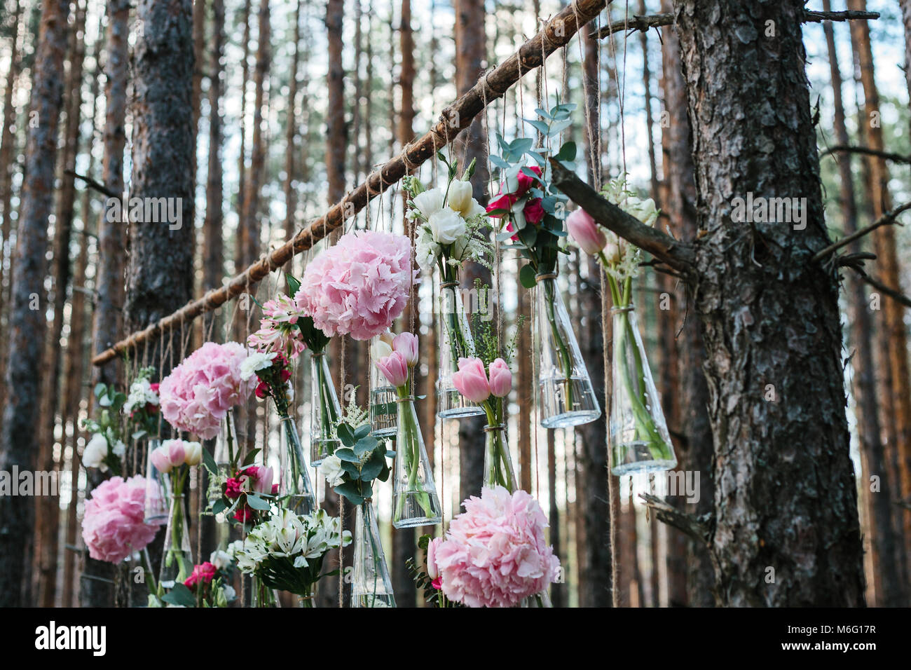 Wedding flowers decoration arch in the forest. The idea of a wedding ...