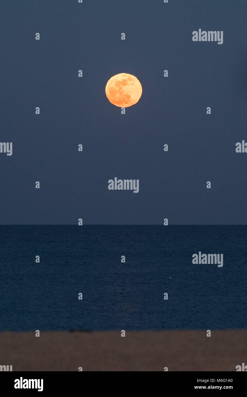 The supermoon over the Mediterranean Sea in Corigliano Calabro, Italy ...