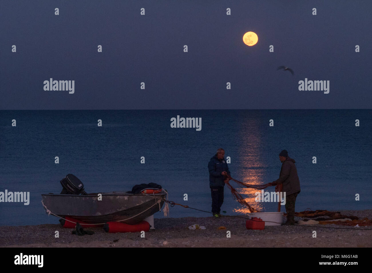 The supermoon over the Mediterranean Sea in Corigliano Calabro, Italy ...