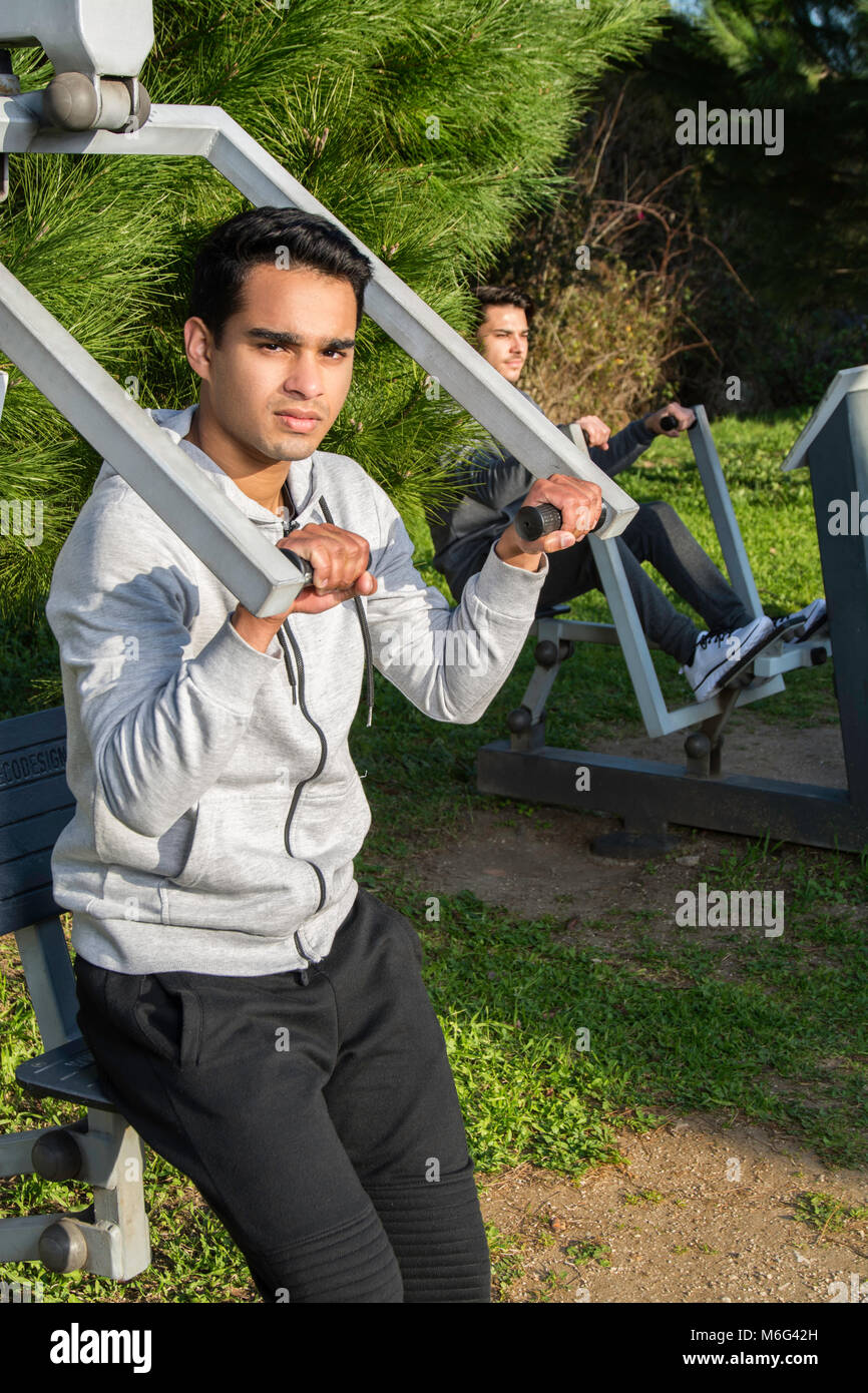 young man making exercise, working on work bench Stock Photo - Alamy