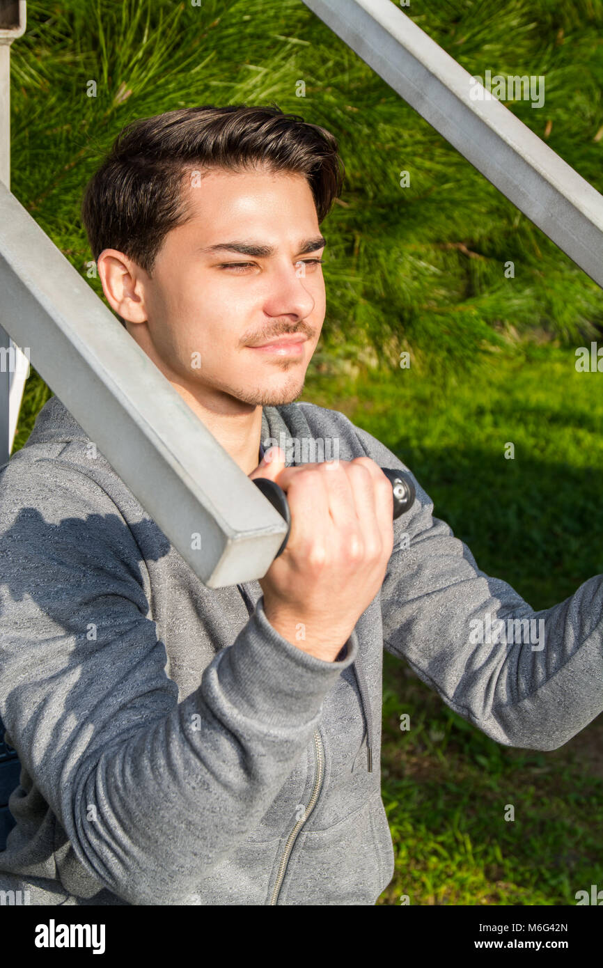 young man making exercise, working on work bench Stock Photo - Alamy