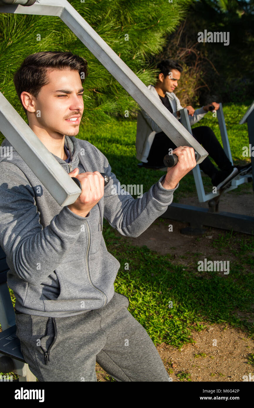 young man making exercise, working on work bench Stock Photo - Alamy