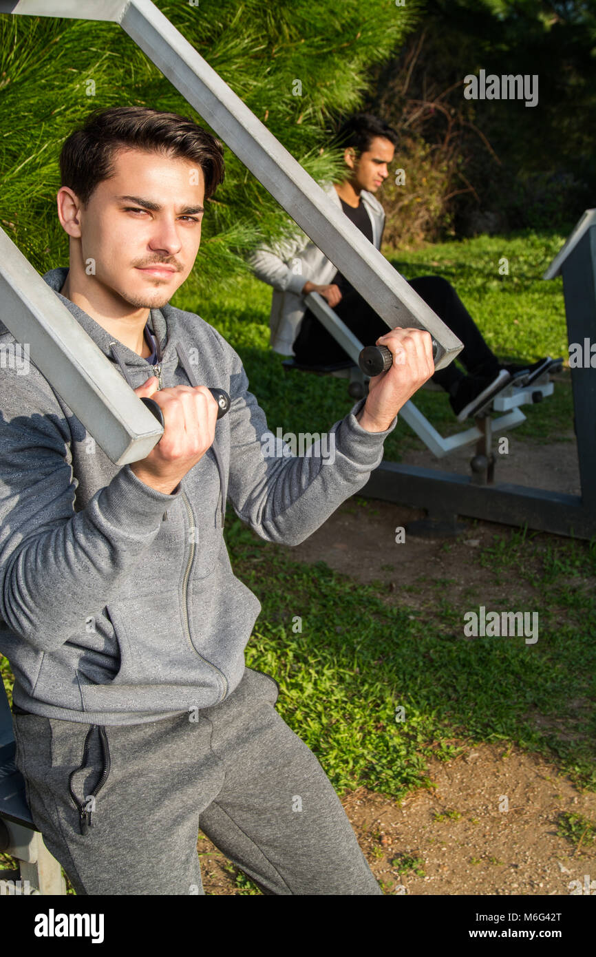 young man making exercise, working on work bench Stock Photo - Alamy