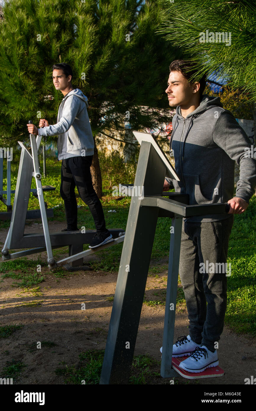 young man making exercise, working on work bench Stock Photo - Alamy