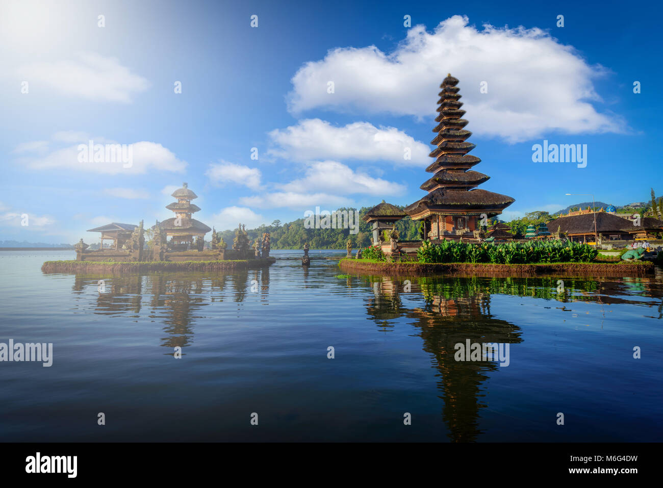 Pura Ulun Danu Bratan, Hindu temple with boat in Bratan lake landscape ...