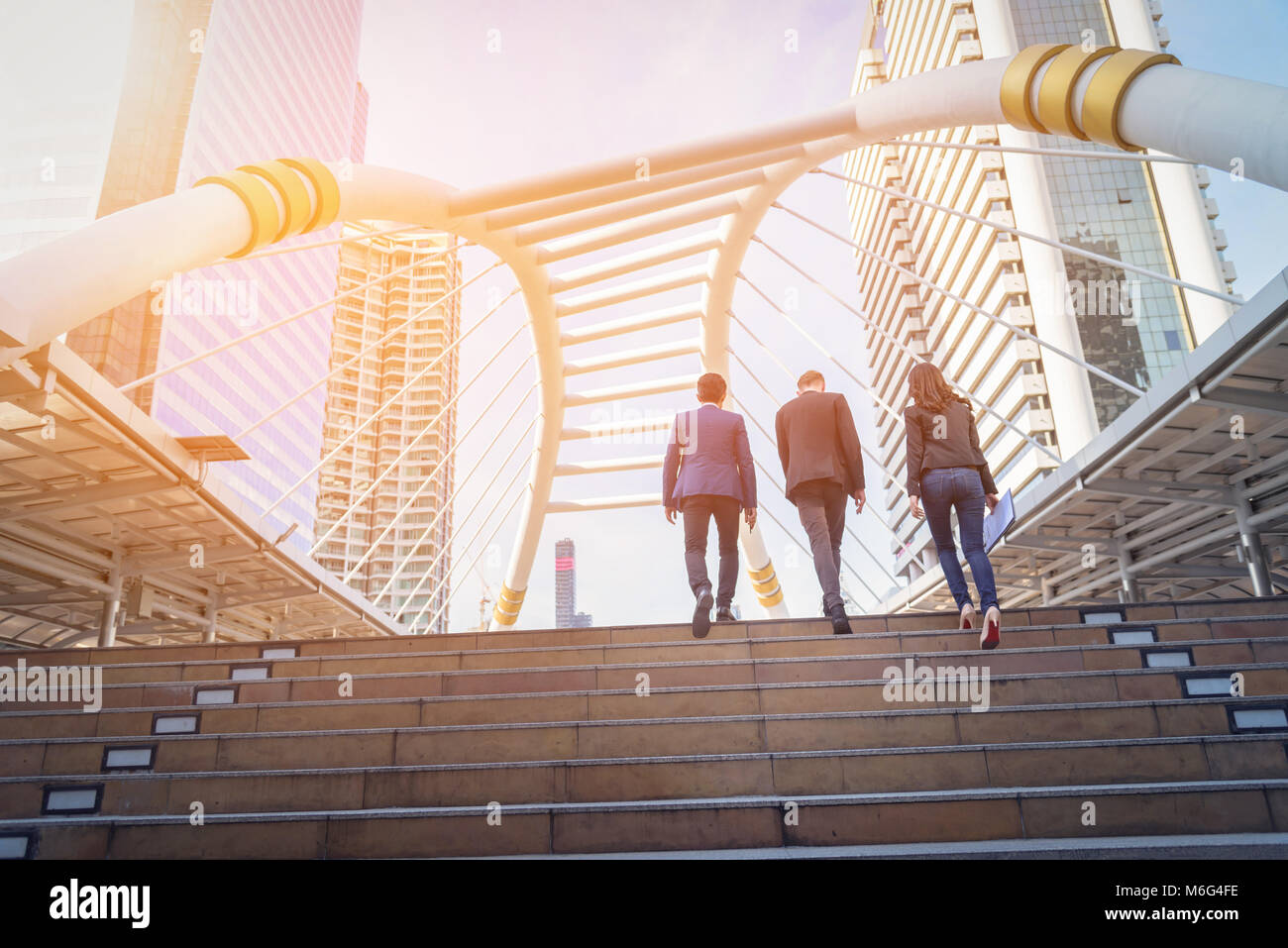 Group people climbing stairs street hi-res stock photography and images ...