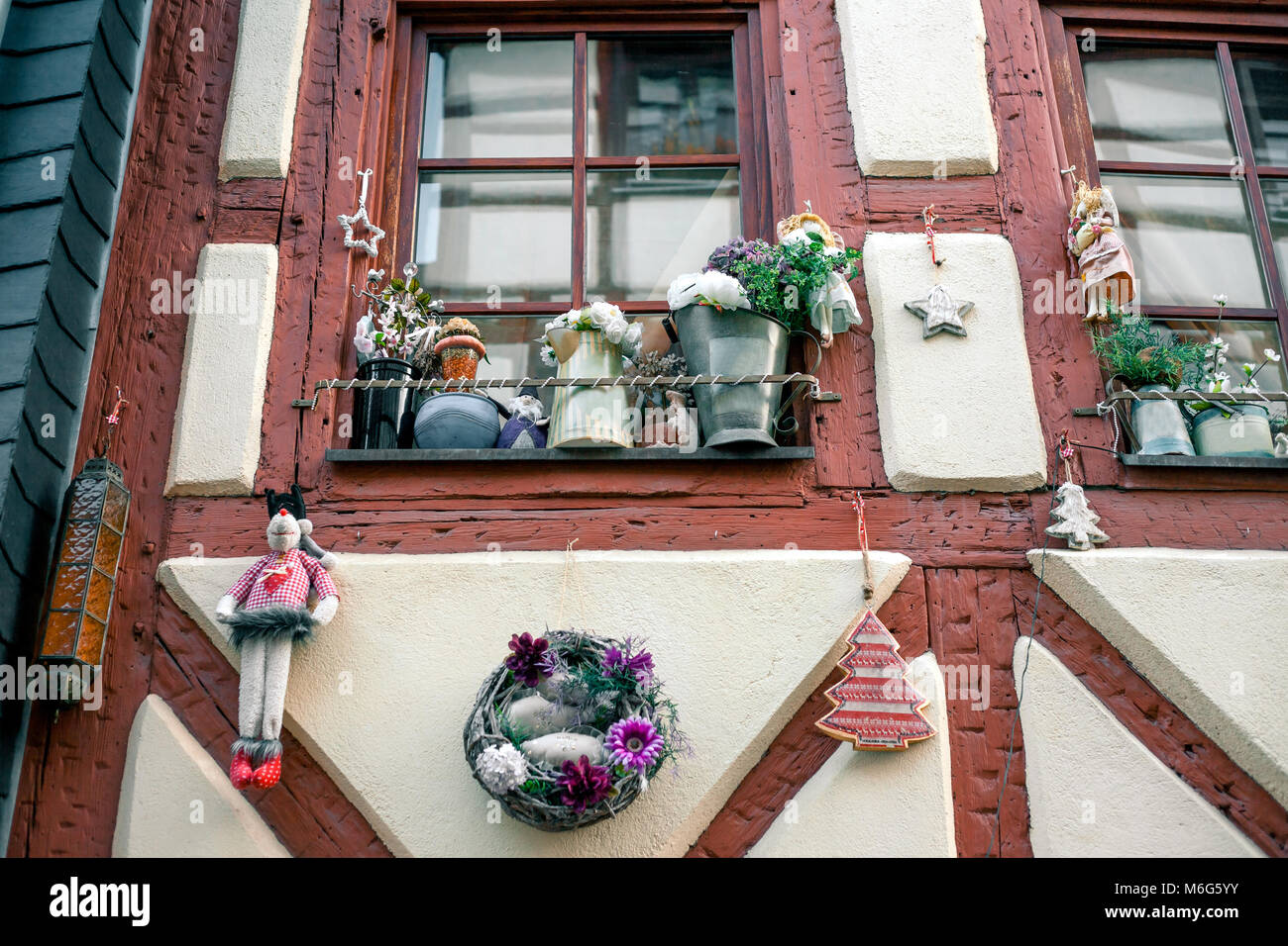 Christmas decorations of houses in Germany. Celebrating the New Year ...