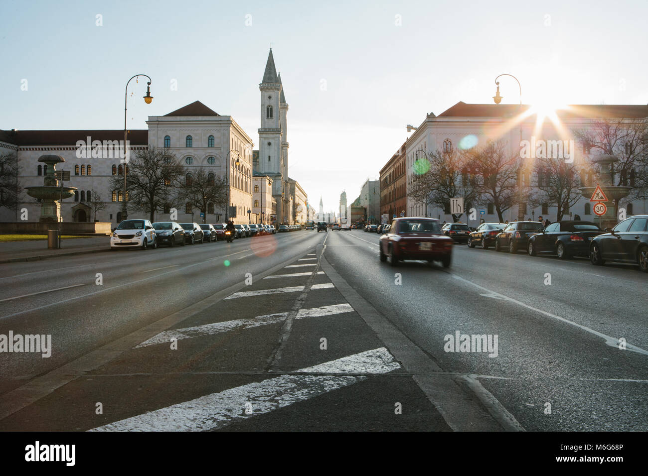 View of the road on the street Leopoldstrasse in Munich - the capital ...