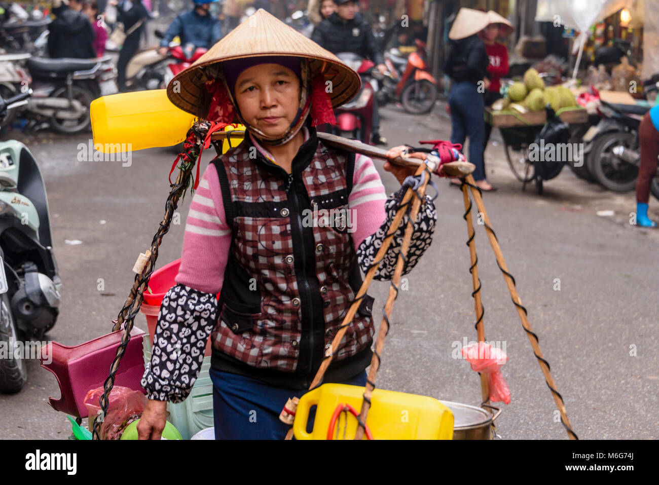 Shoulder carrying pole hi-res stock photography and images - Alamy