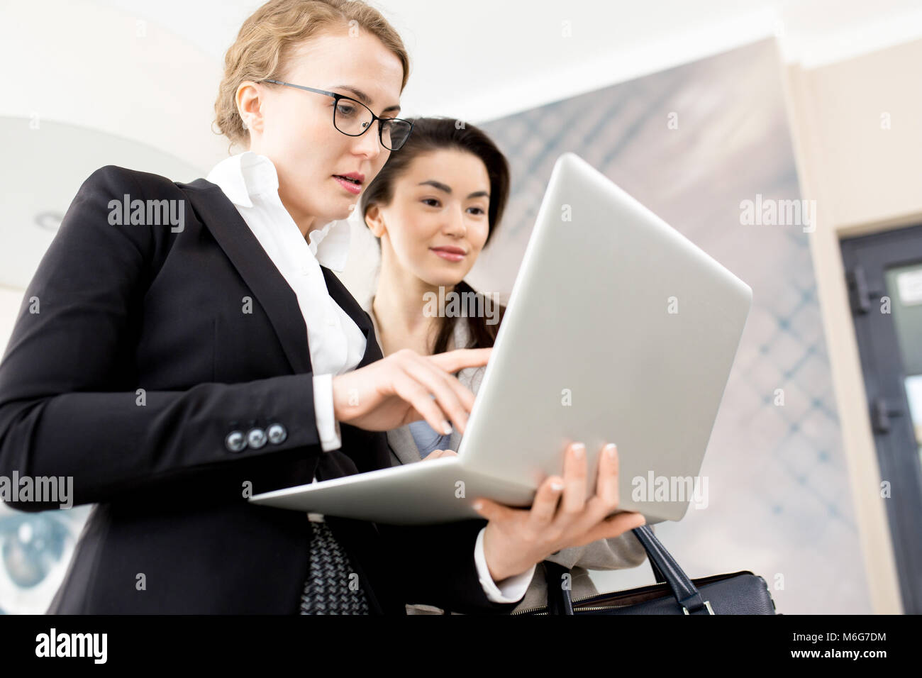 Working Meeting of Beautiful Colleagues Stock Photo - Alamy