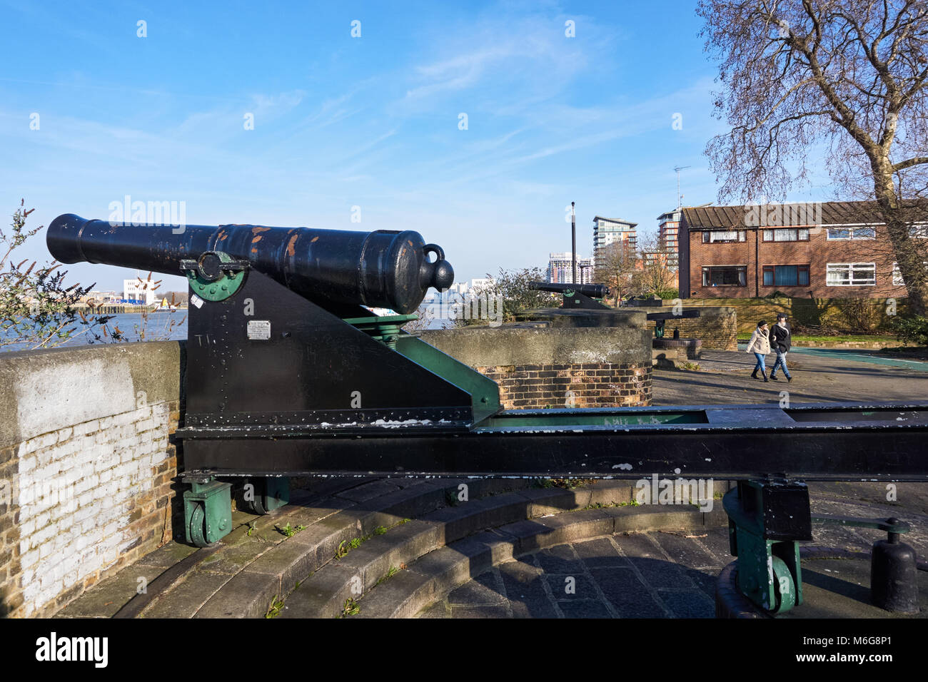Two cannons overlooking the river Thames in Woolwich, London, England ...