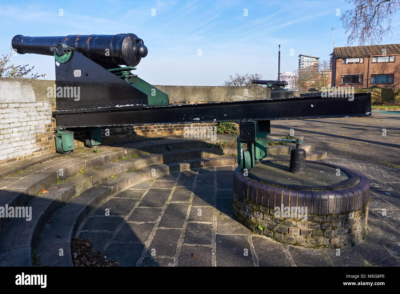 Two cannons overlooking the river Thames in Woolwich, London, England ...