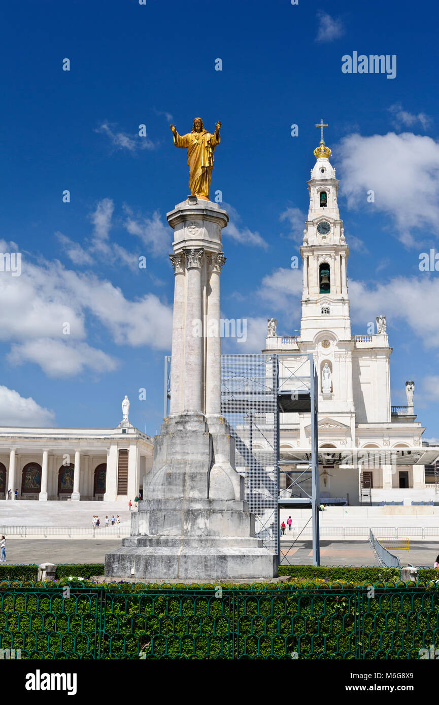 A huge column with a statue of Jesus Christ on top at the Sanctuary of ...