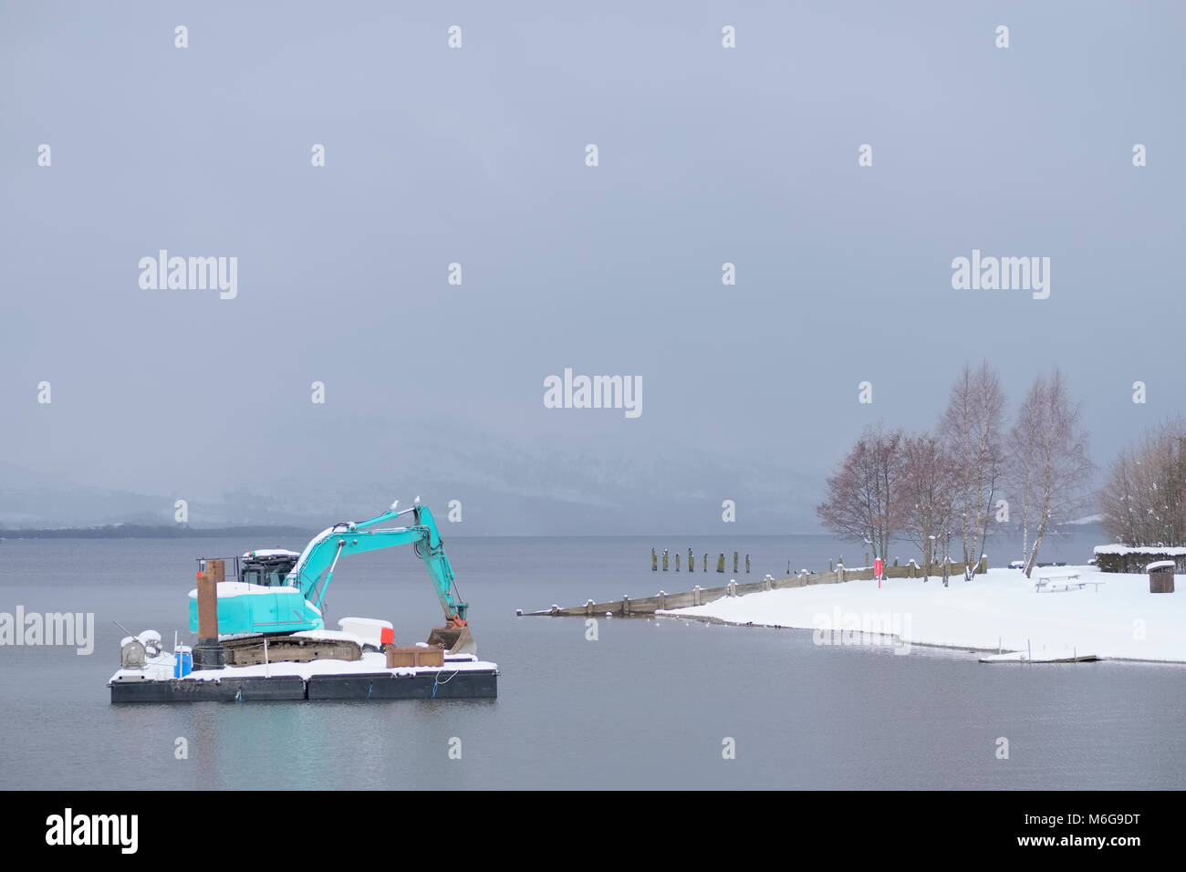 Crane digger on sea water floating platform to transport excavator ...