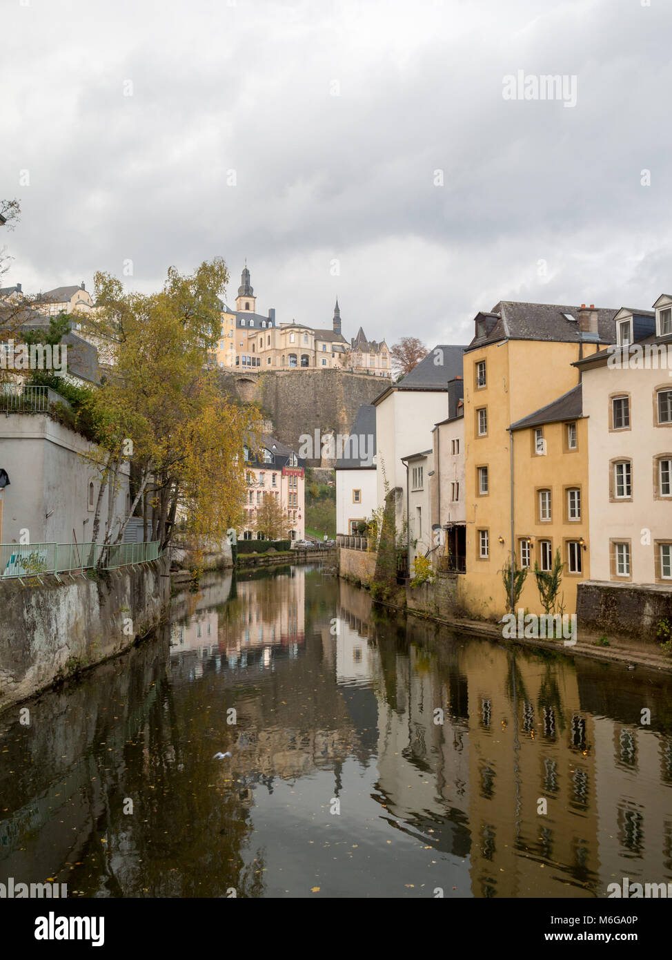 Grande houses reflected on Alzette River Stock Photo - Alamy