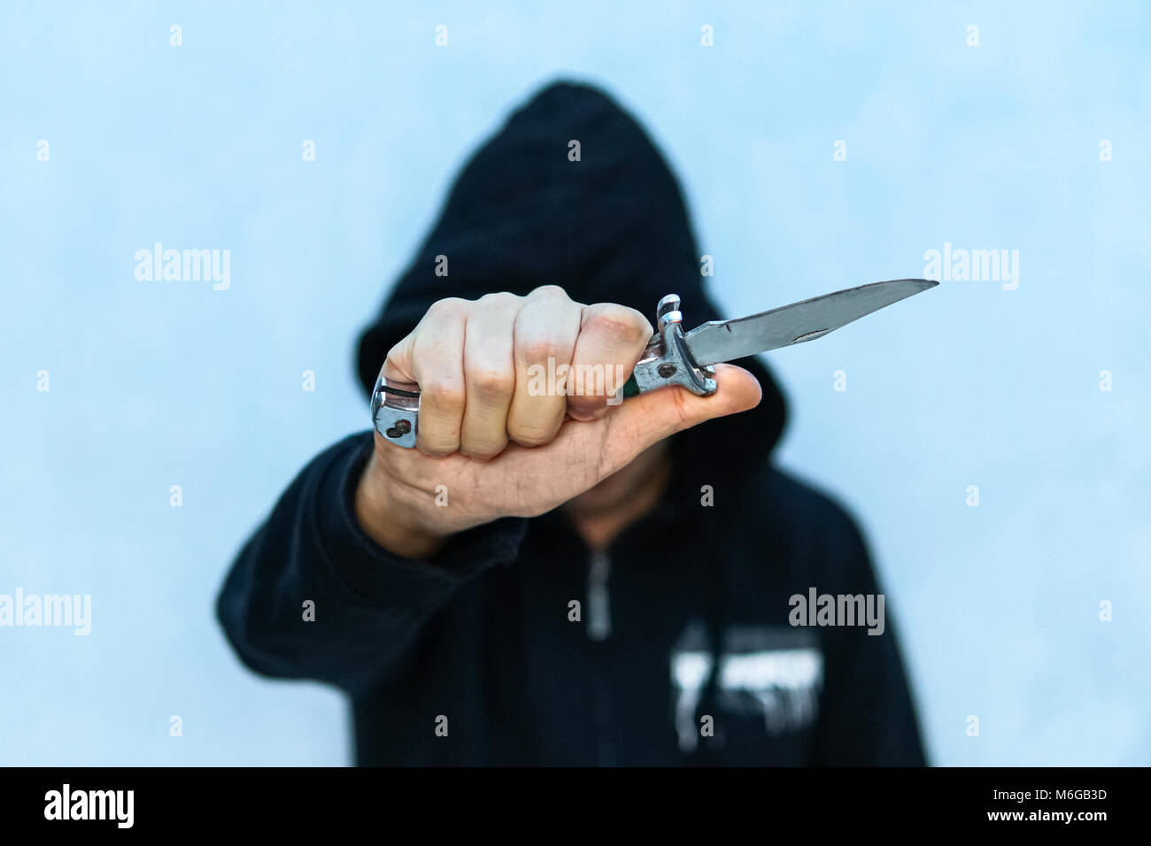Hooded assassin hi-res stock photography and images - Alamy