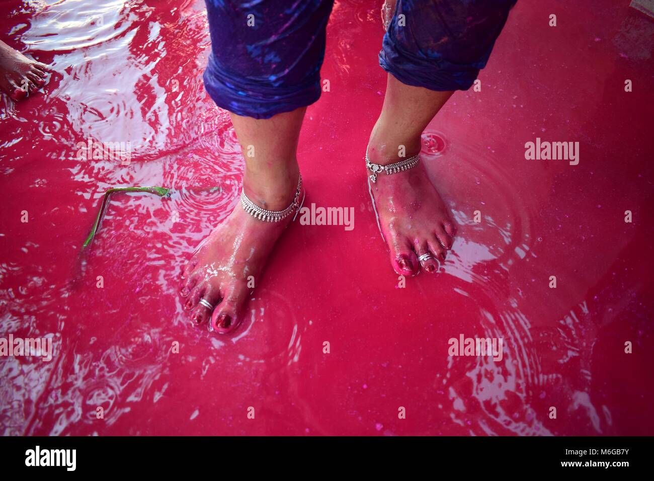 Allahabad, India. 03rd Mar, 2018. Revelers smeared in color powder ...