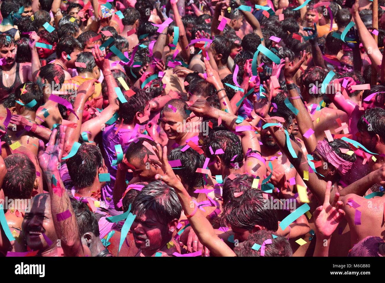 Allahabad, India. 03rd Mar, 2018. Revelers smeared in color powder ...