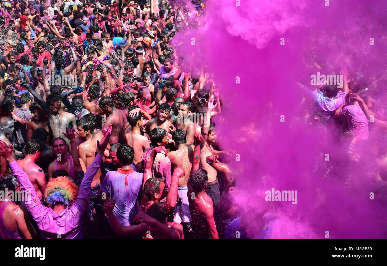 Allahabad, India. 03rd Mar, 2018. Revelers smeared in color powder ...