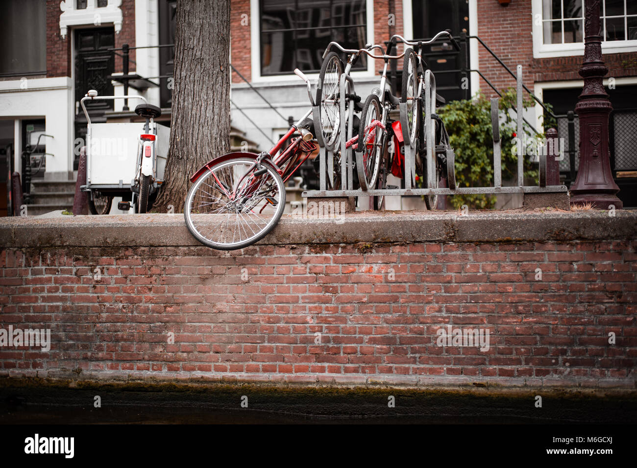 The fallen bicycle Stock Photo - Alamy