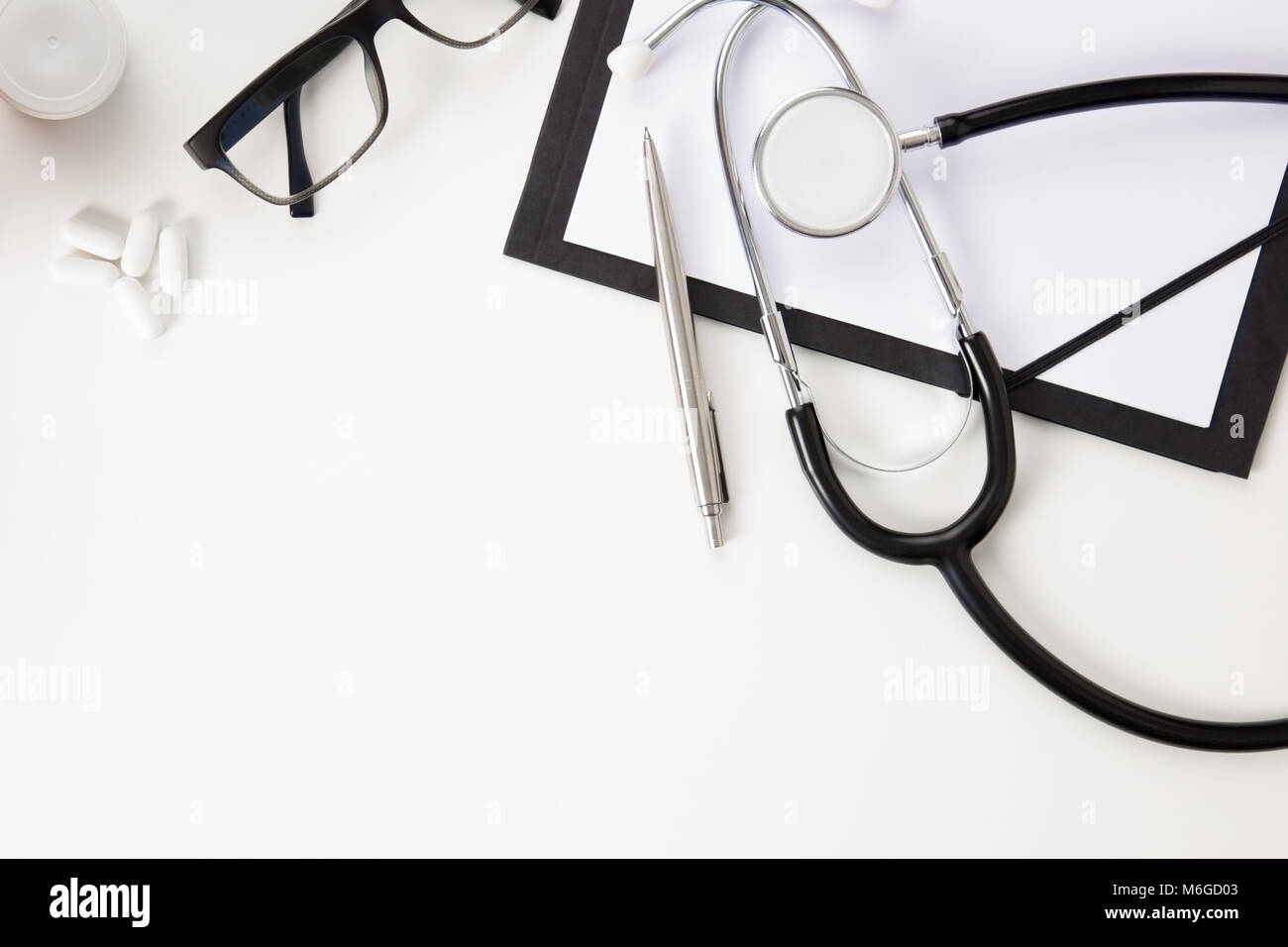 Doctors Office Desk with Thermometer And Medical Instruments On White ...