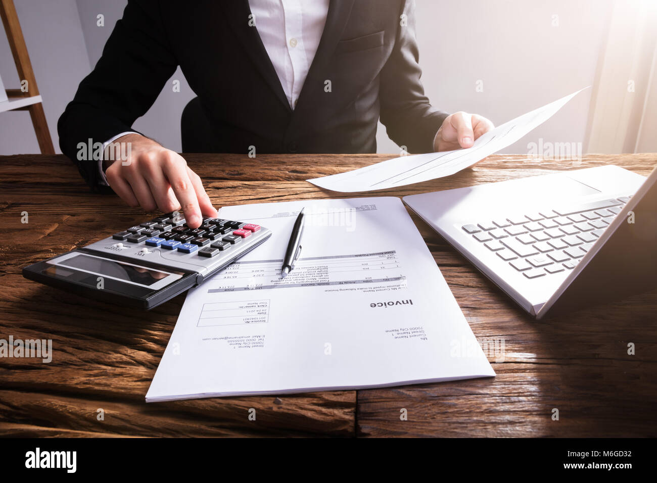 Male hand calculating domestic calculator hi-res stock photography and ...