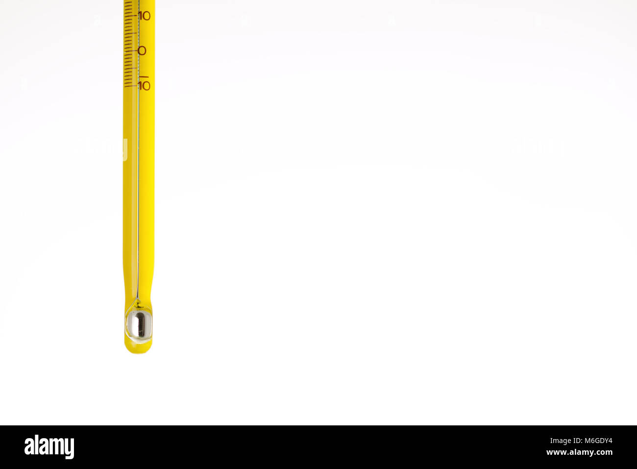 yellow mercury thermometer isolated on a white background. Scientific ...