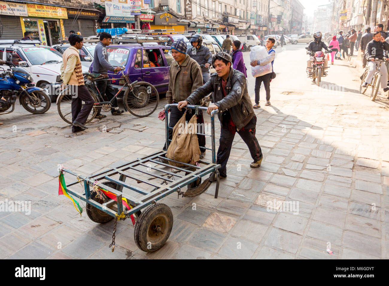 A Man Wheels a Cart in Nepal Stock Photo - Alamy