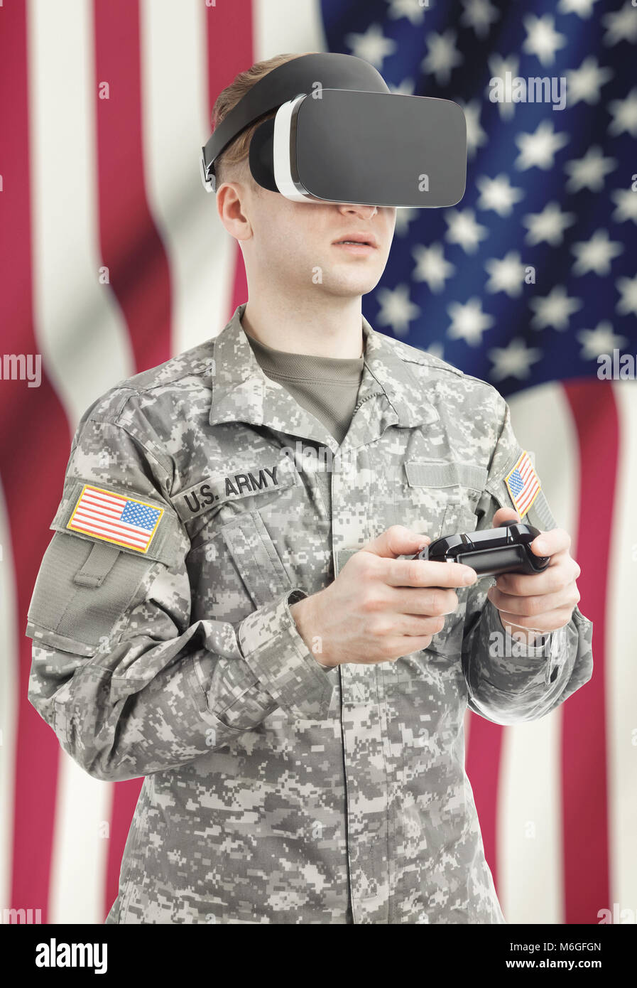 Indoors close up shot of soldier wearing VR goggles and controller in ...