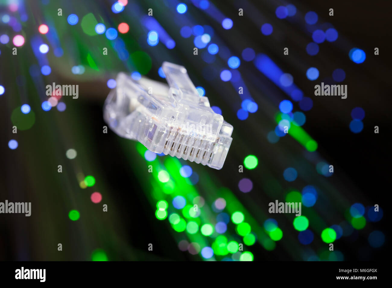 LAN and optical fiber cable in the darkness - studio shot Stock Photo ...