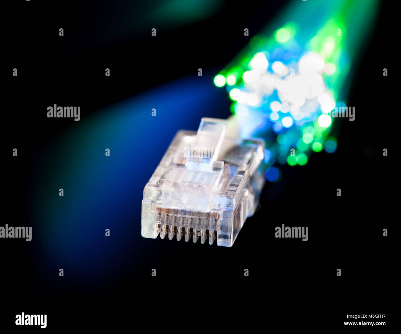 LAN and optical fiber cable in the darkness - studio shot Stock Photo ...