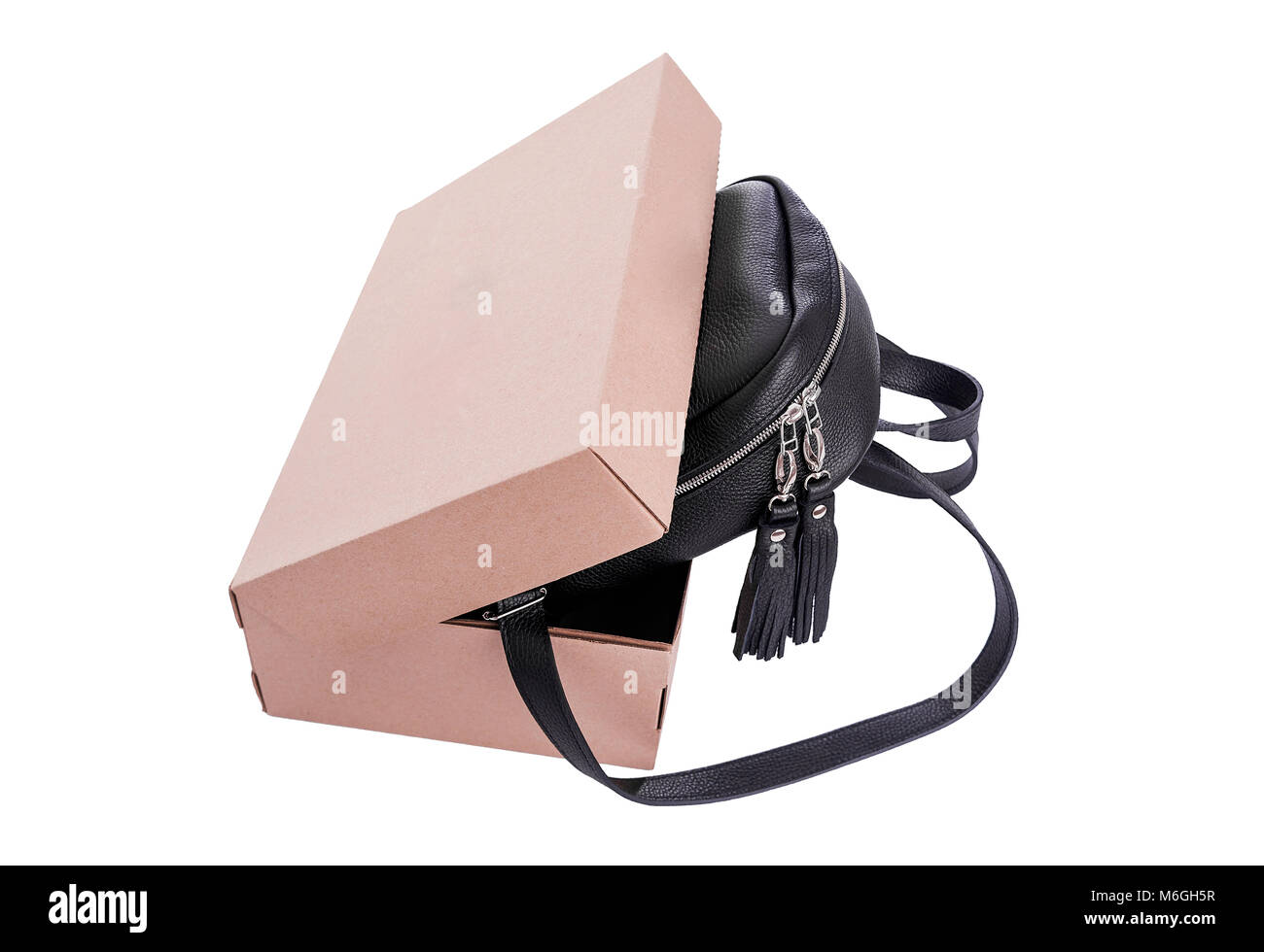 Leather backpack in a cardboard box Stock Photo - Alamy