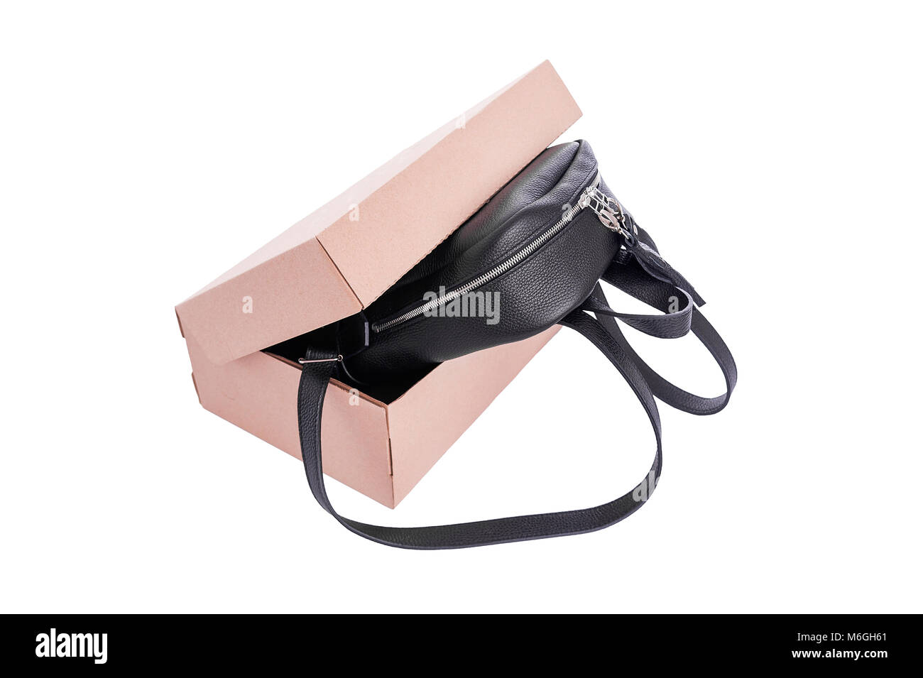 Leather backpack in a cardboard box Stock Photo - Alamy