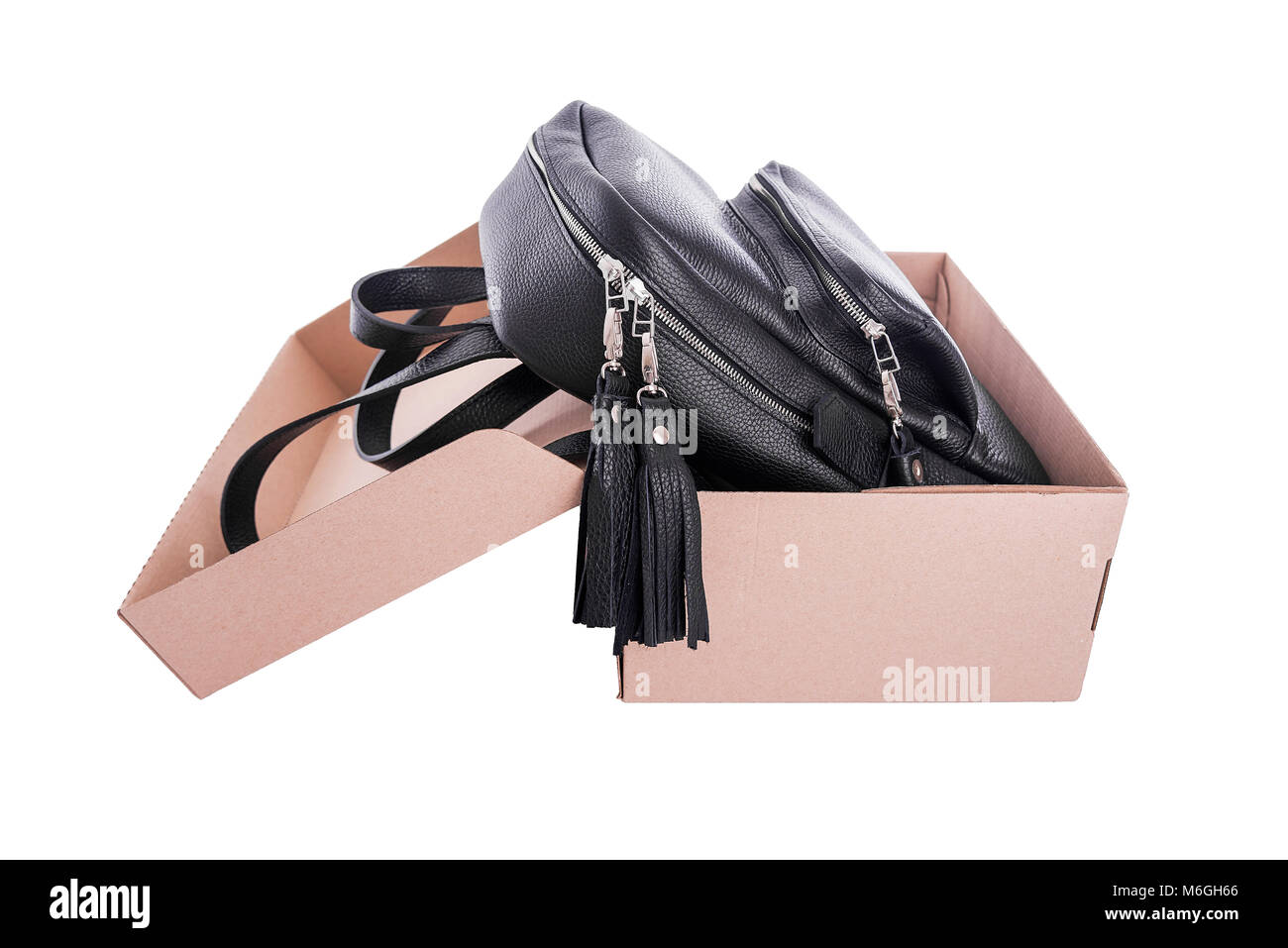 Leather backpack in a cardboard box Stock Photo - Alamy