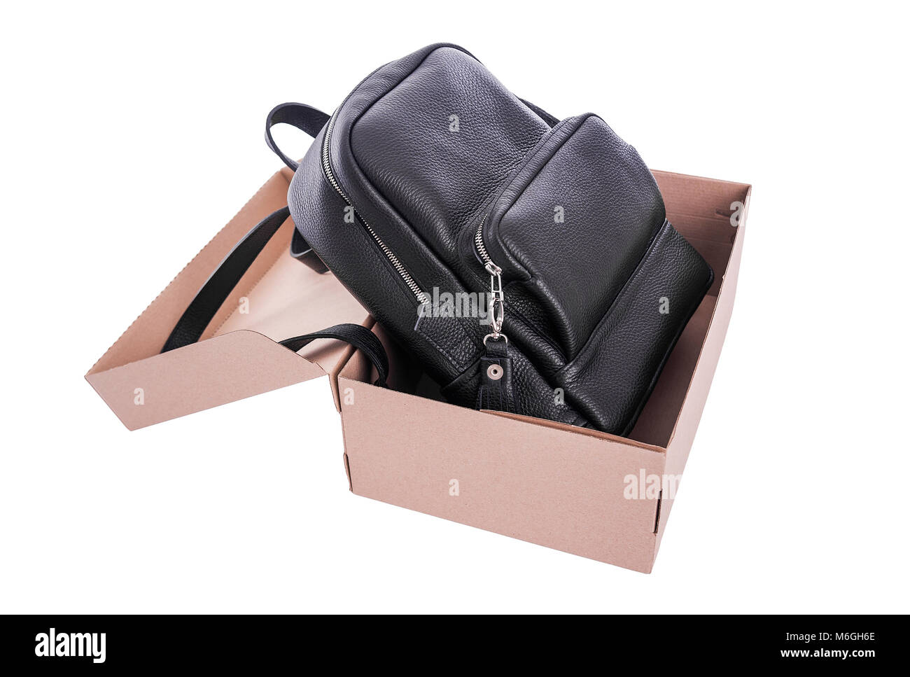 Leather backpack in a cardboard box Stock Photo - Alamy