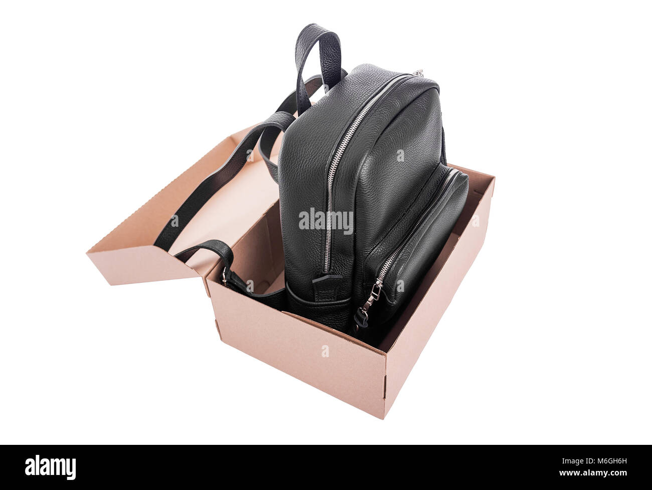Leather backpack in a cardboard box Stock Photo - Alamy