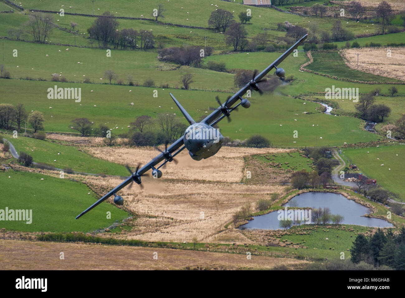 USAF MC130 flying through mach loop Stock Photo - Alamy