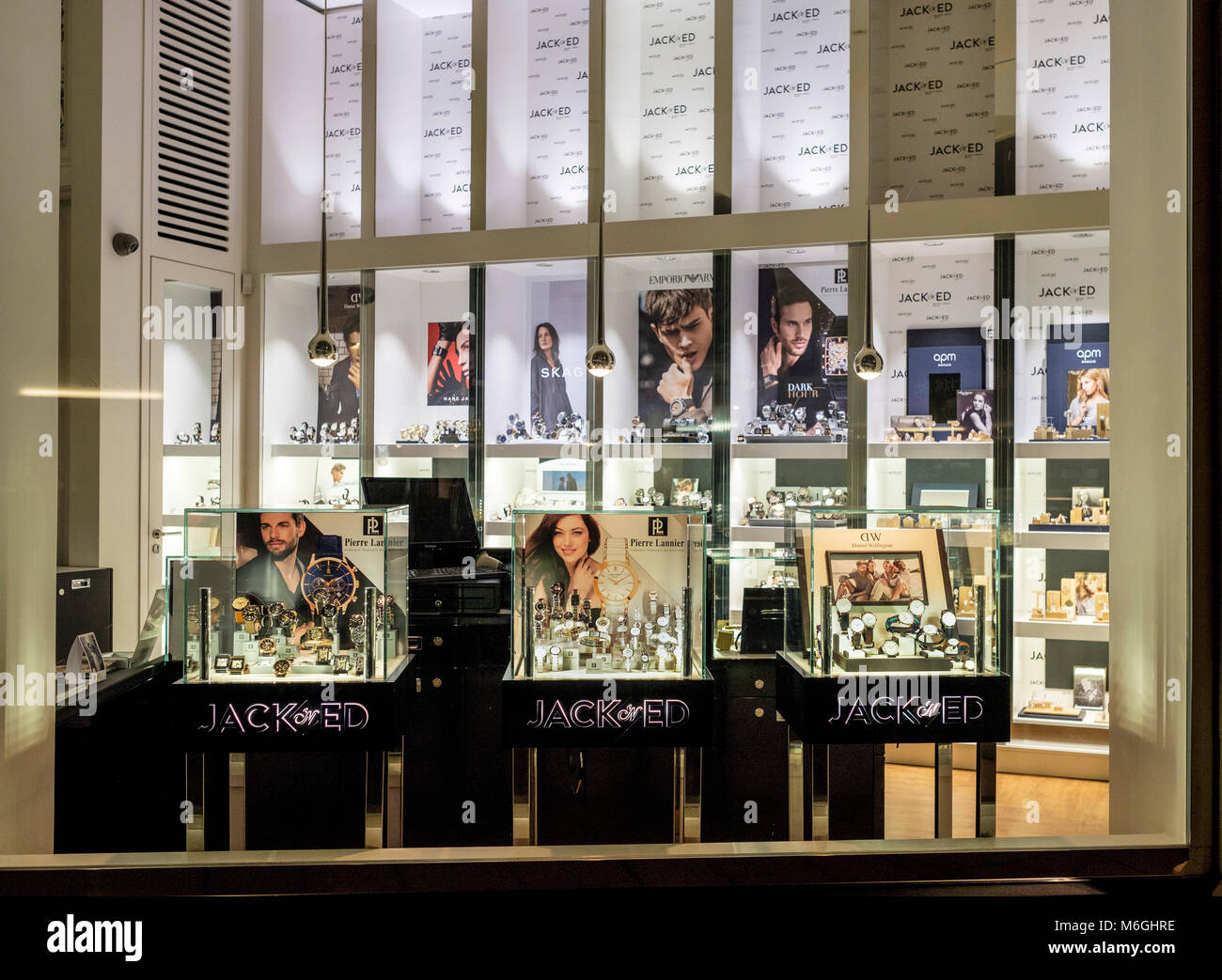 Illuminated watchmaker shop at night hi-res stock photography and ...