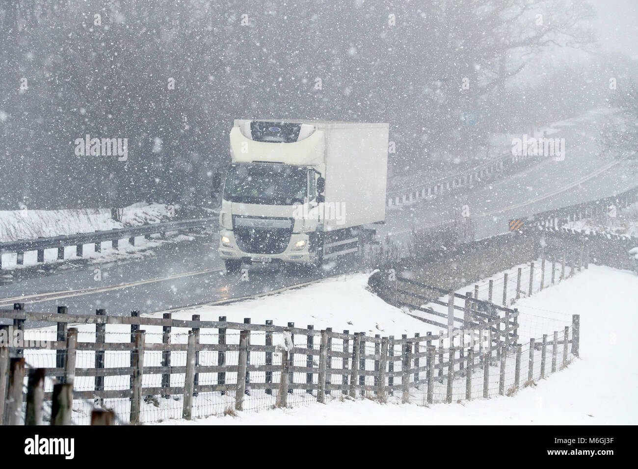 A lorry drives through the snow on the A66 in Durham as the cold ...