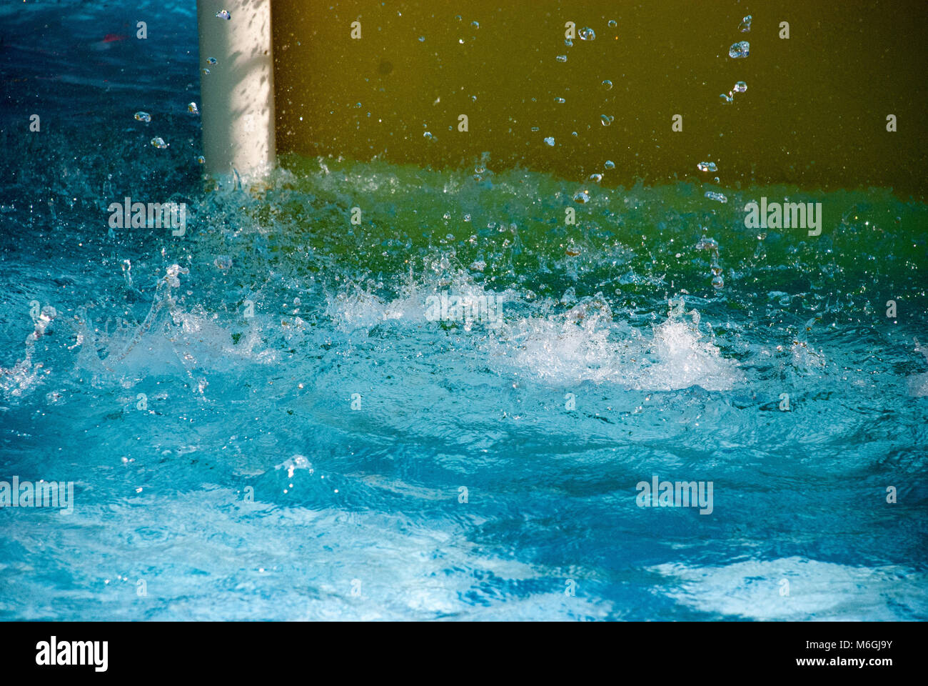 Water splashes close-up in a sunlit water park Stock Photo - Alamy