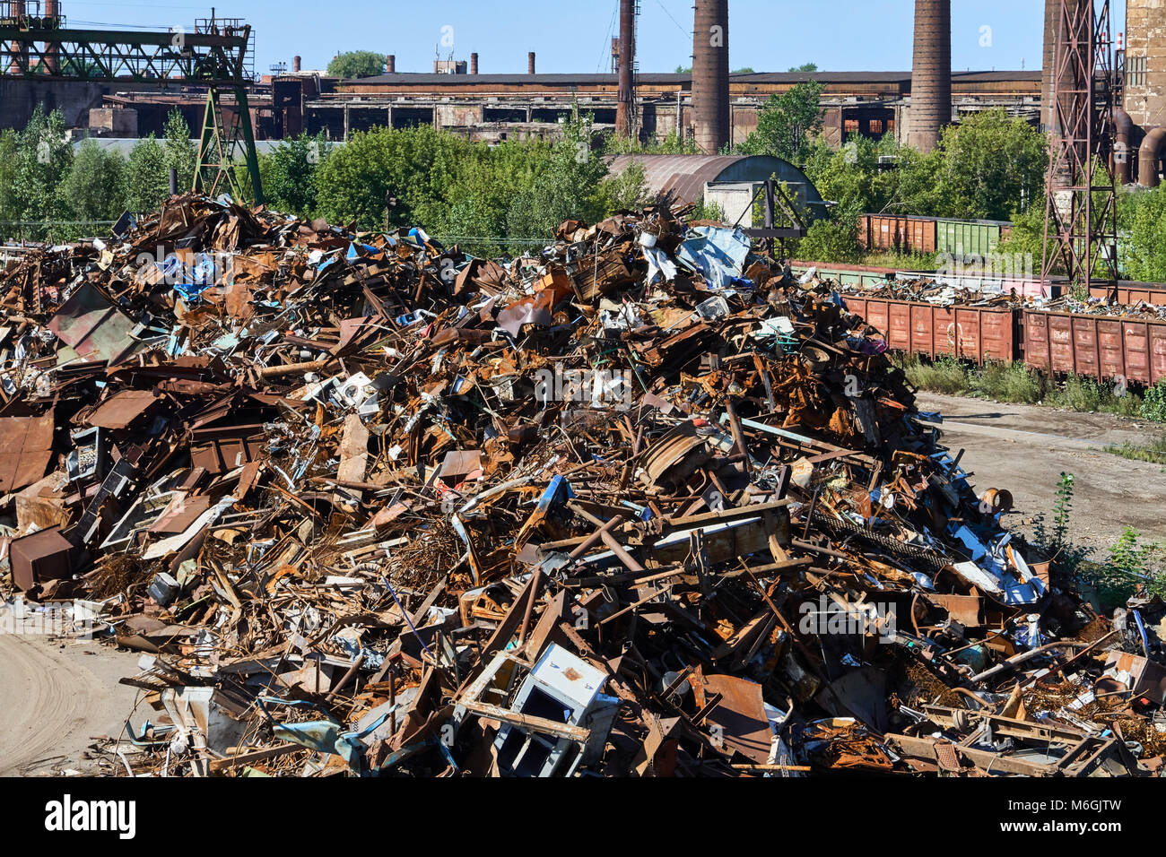 Scrap metal dump for recycling on metallurgical plant territory Stock ...
