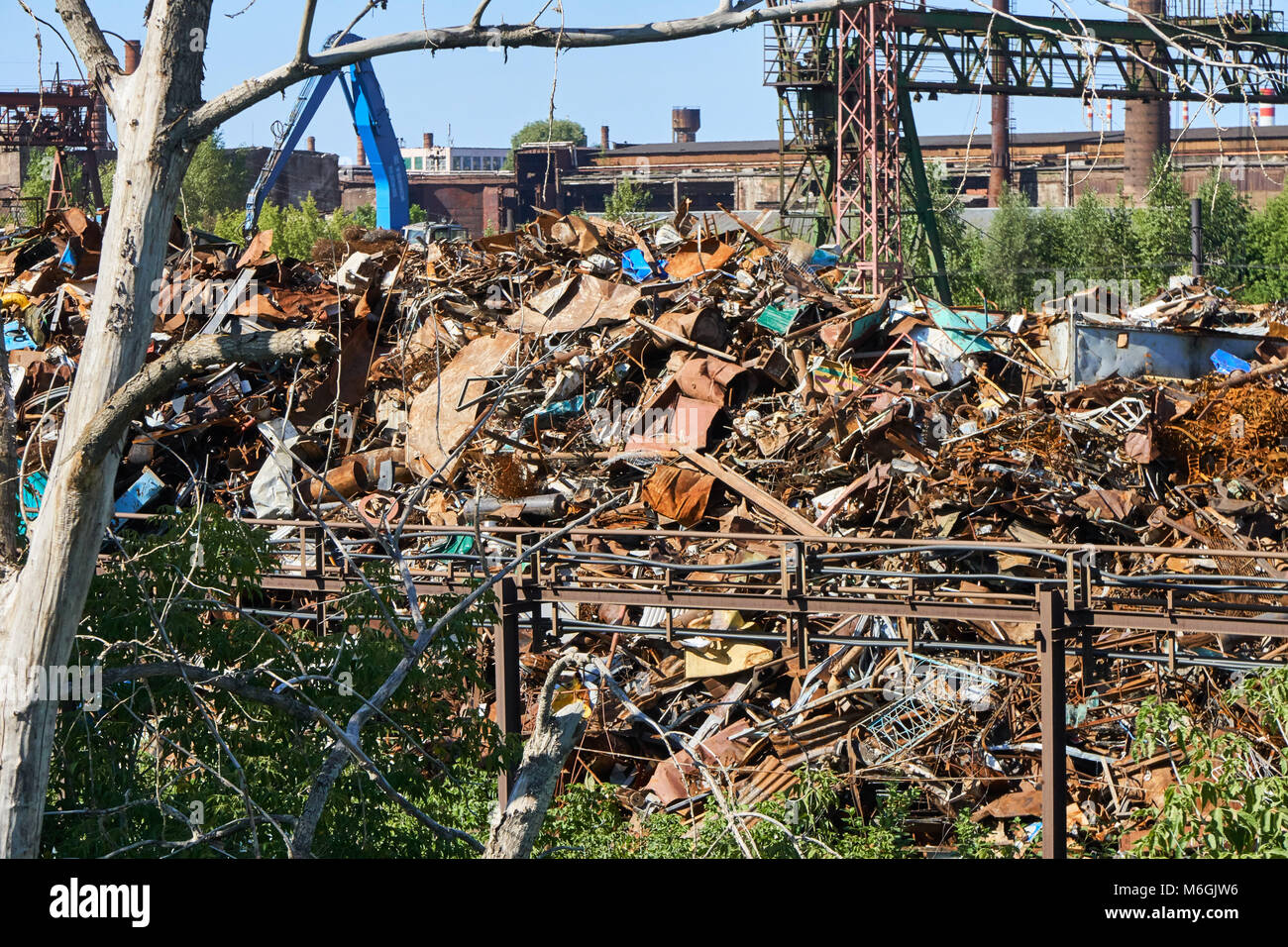 Scrap metal dump for recycling on metallurgical plant territory Stock ...