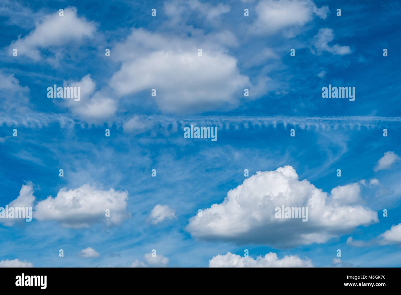 Blue sky containing different types of cirrus and cumulus clouds as ...