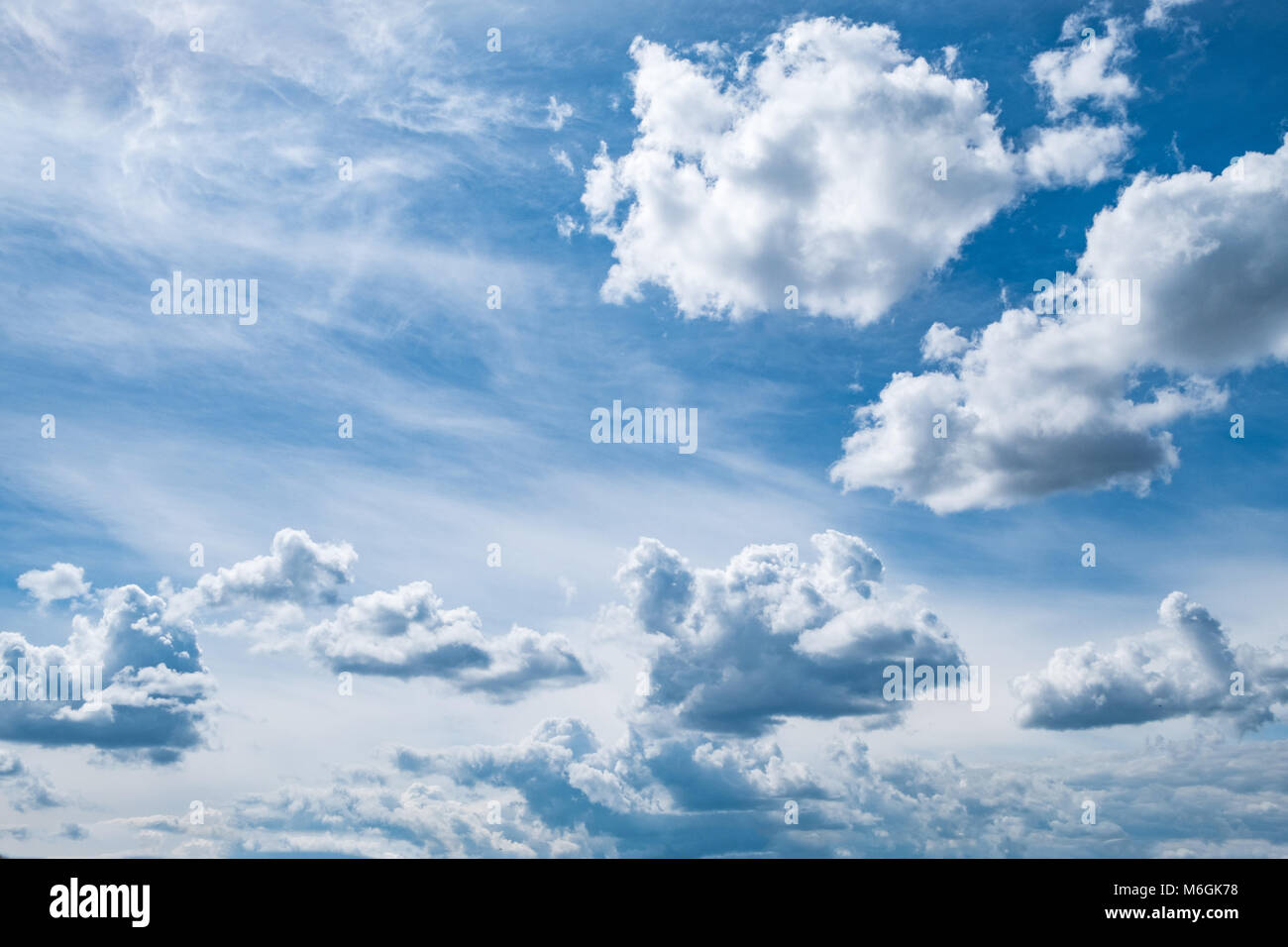 Blue sky containing different types of cirrus and cumulus clouds as ...