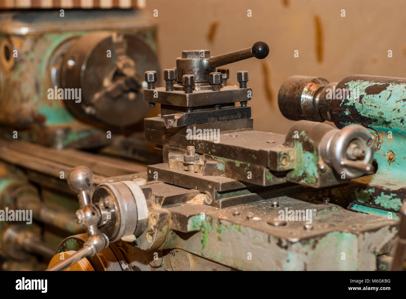 Old metal lathe machine for metalworking in workshop closeup view Stock ...