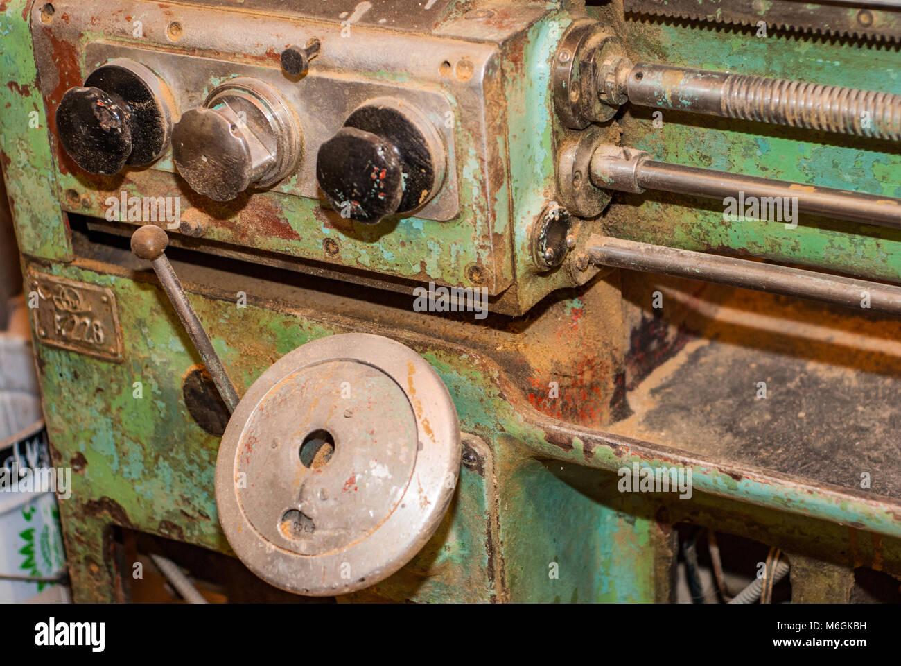 Old metal lathe machine for metalworking in workshop closeup view Stock ...